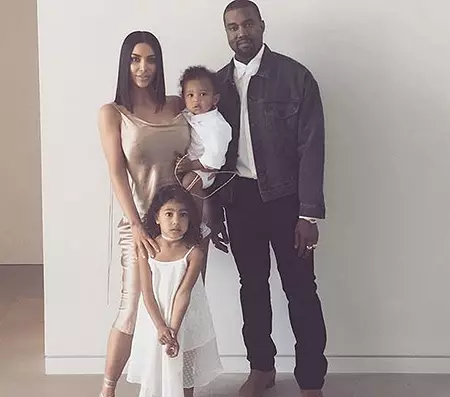 Kanye West and Kim Kardashian with children