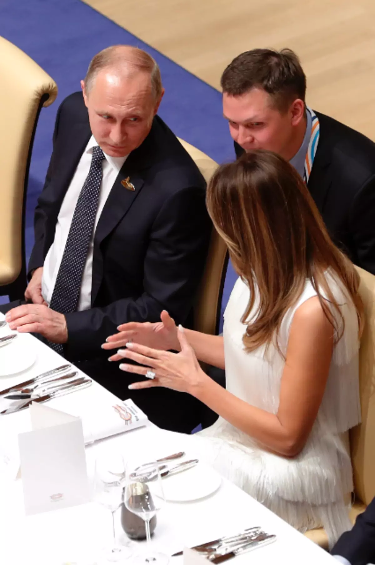 Vladimir Poetin en Melania Trump