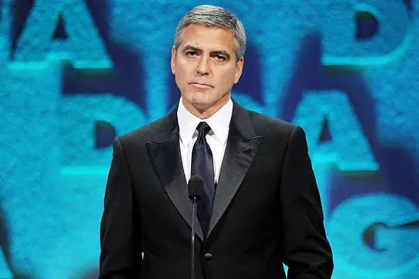 George'as Clooney gynė būsimą motiną nuo tabloido