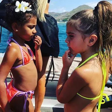 Daughters Kim and Courtney Kardashian - North and Penelope